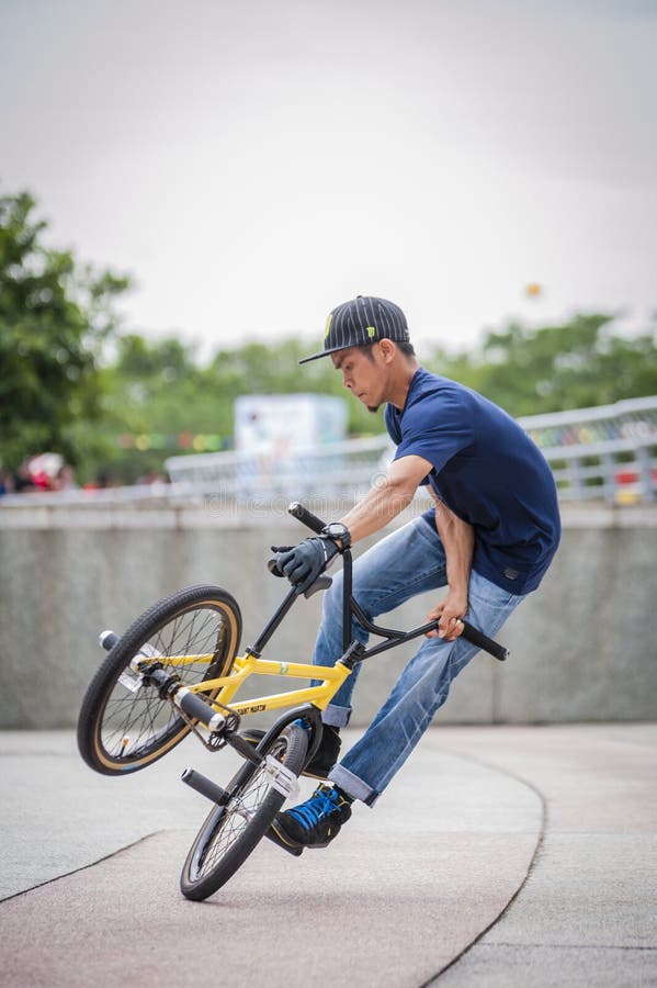 Riding Bicycle editorial stock photo. Image of games - 54584608