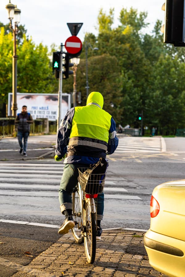 Riding a Bicycle on the City Streets. Commute To Work in Bucharest ...