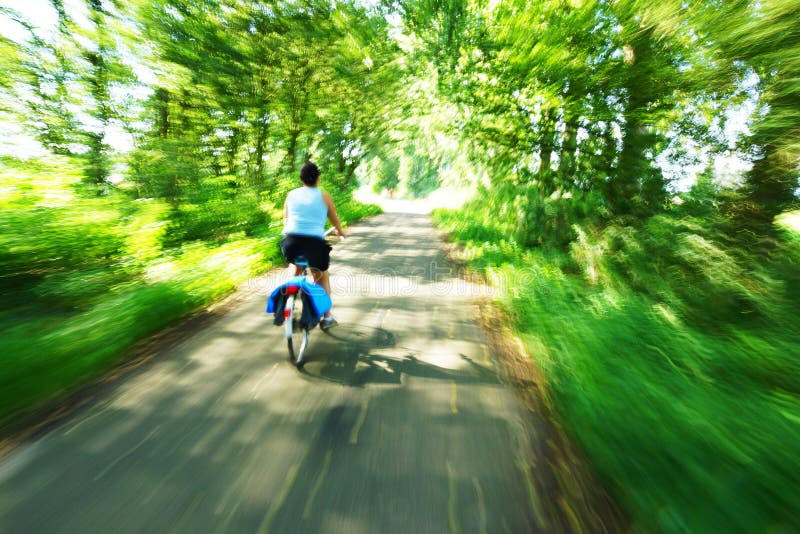 Riding a bicycle stock photo. Image of moving, dynamic - 30325132