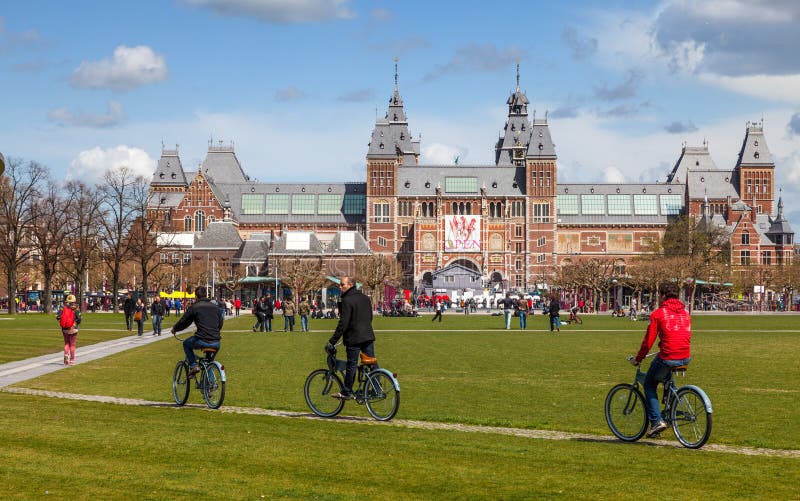 Riding Bicycles in Amsterdam Editorial Stock Photo - Image of landmark ...