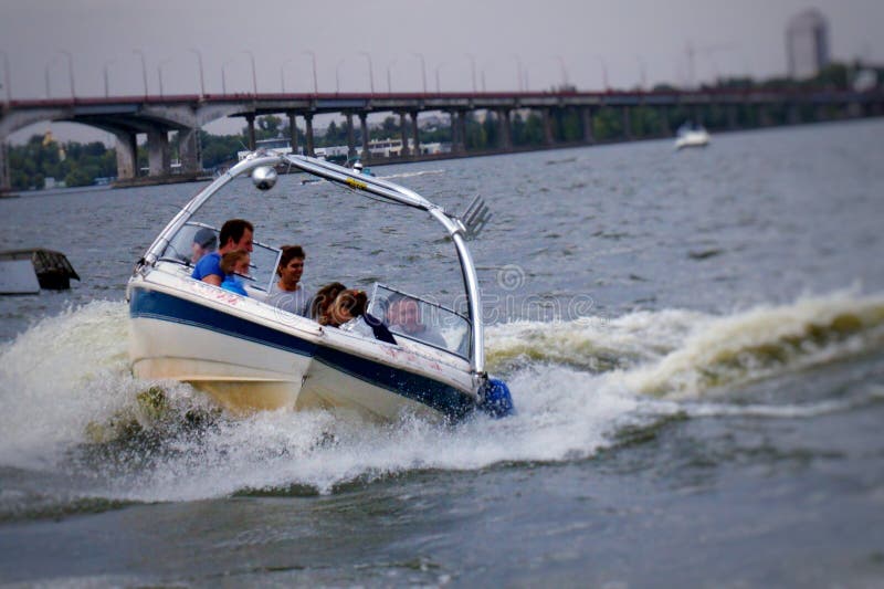 Riding a Boat on the River, in the Passable Weather. Editorial Stock ...