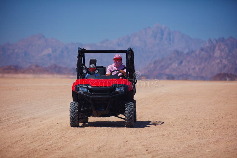Riding a Buggy Car through the Desert. Thrill Tourism Adventures Stock ...