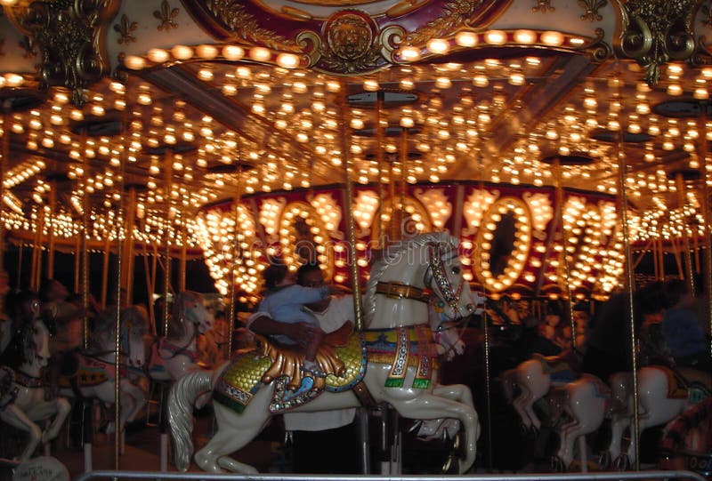 Riding the carousel stock image. Image of child, park, musical - 116413