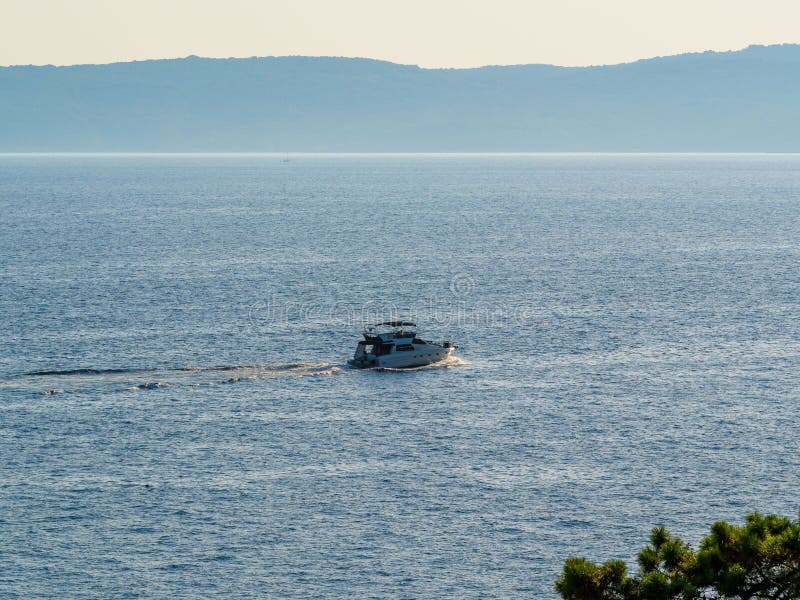 Riding on an Electric Boat on the Calm Seawater Surface Stock Photo ...