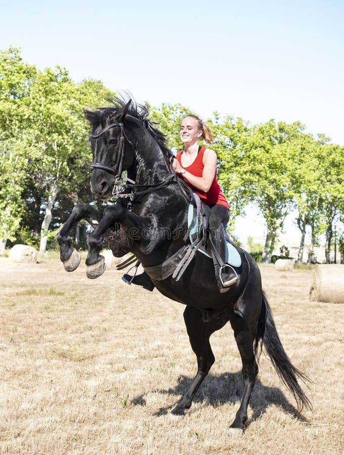 Riding girl and horse stock photo. Image of horseback - 243200632