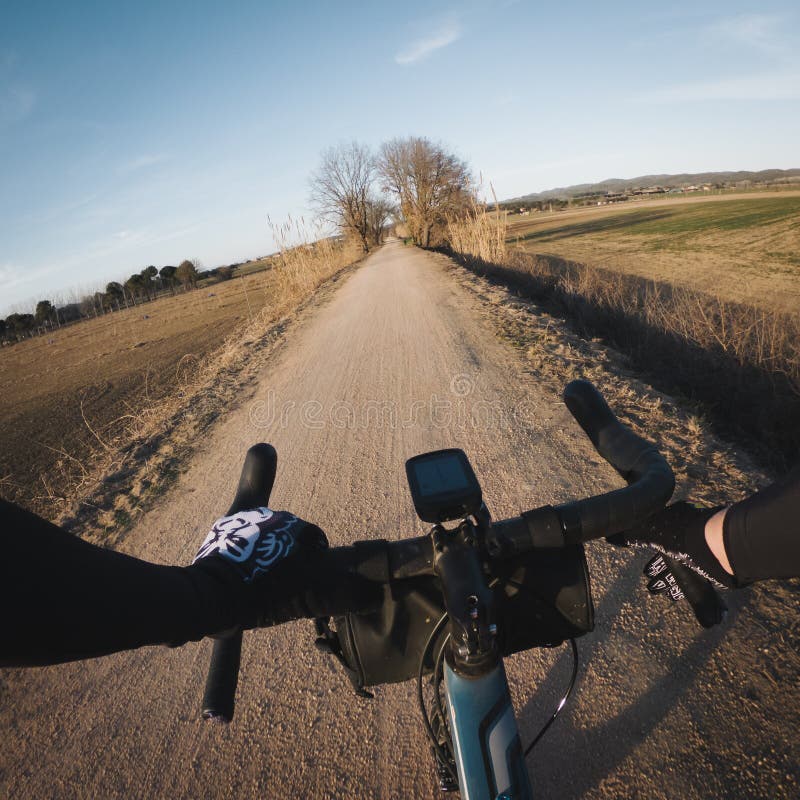 Riding a Gravel Bicycle by the Lower Section of the Drop Bar Handle Bar ...