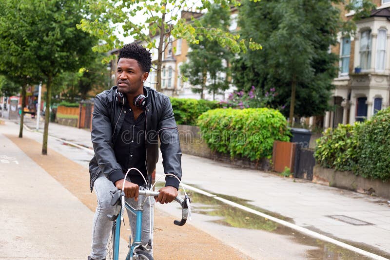 Riding his bike stock image. Image of city, commuter - 76255855