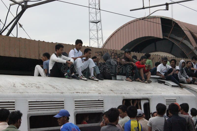 Riding on the Rooftop editorial photography. Image of adult - 23460582