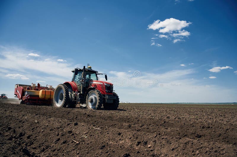 Riding, Side View. Agricultural Machinery, Tractor on the Field Stock ...