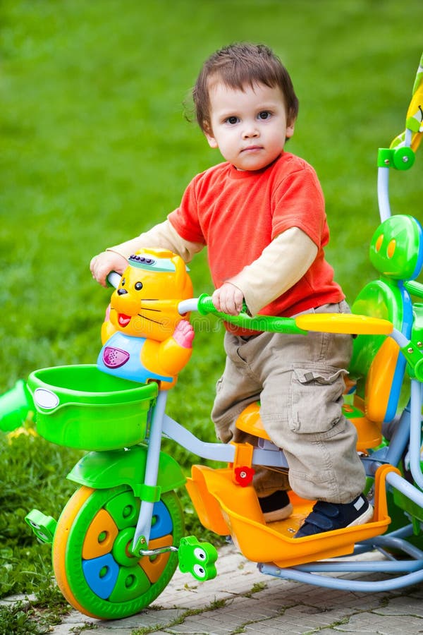 Baby riding motorcycle stock image. Image of outdoors - 20138157