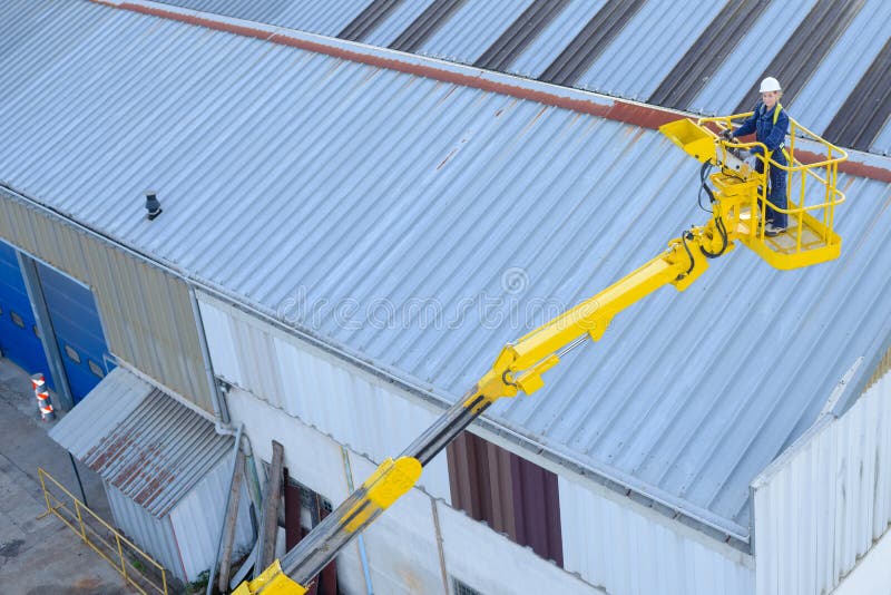 Riding a truck elevator stock image. Image of millwright - 254758909