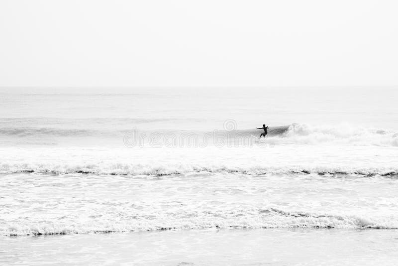 Riding the waves of Ocean stock photo. Image of waves - 104587532