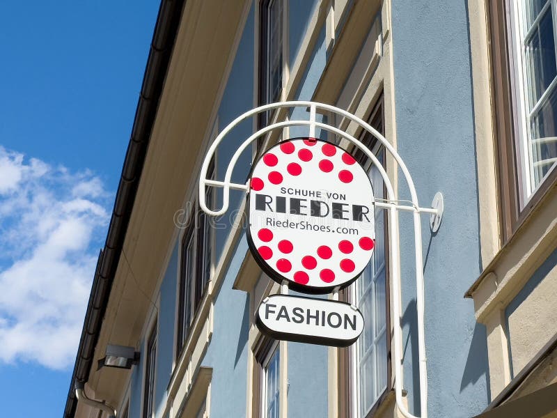 Rieder Shoes Storefront Sign on Building Exterior in Urban Setting ...