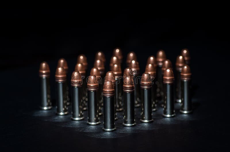Rifle bullets over table stock photo. Image of group - 67661238
