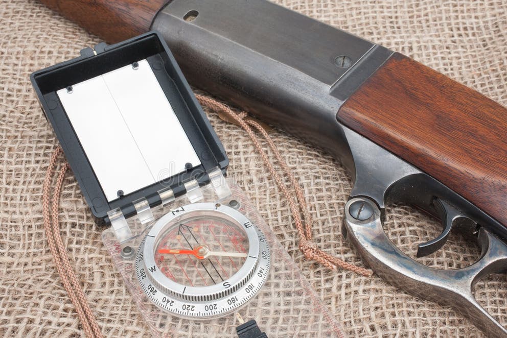 Rifle and Compass stock image. Image of antique, sport - 64786419