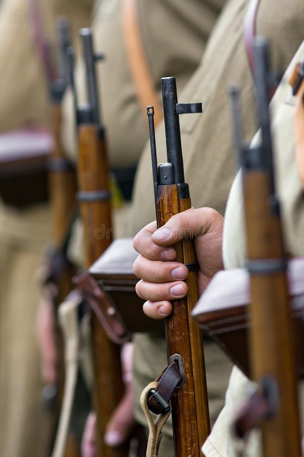 A Rifle In A Man`s Hand, Close-up. Hunter With A Weapon On The Hunt ...