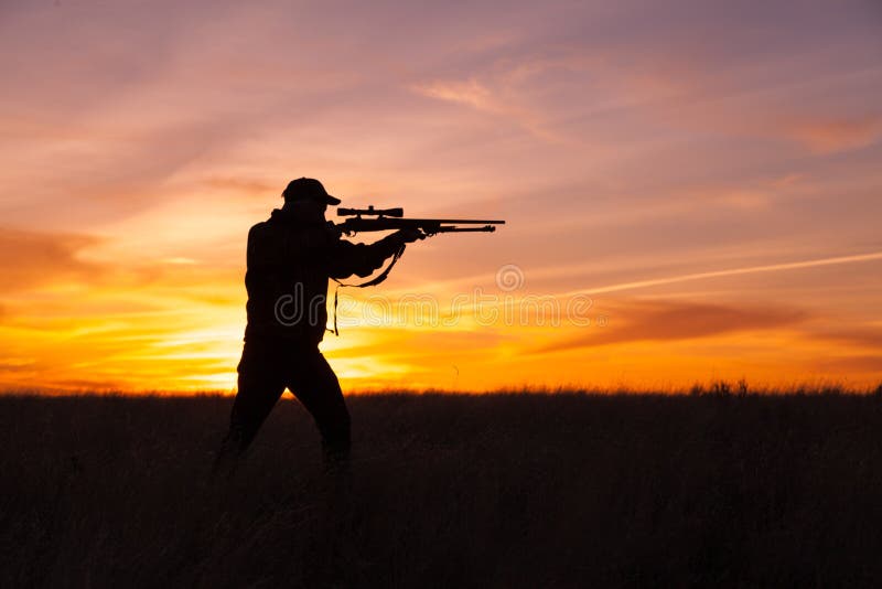 Hunter Shooting in Sunset stock photo. Image of hunt - 18696766