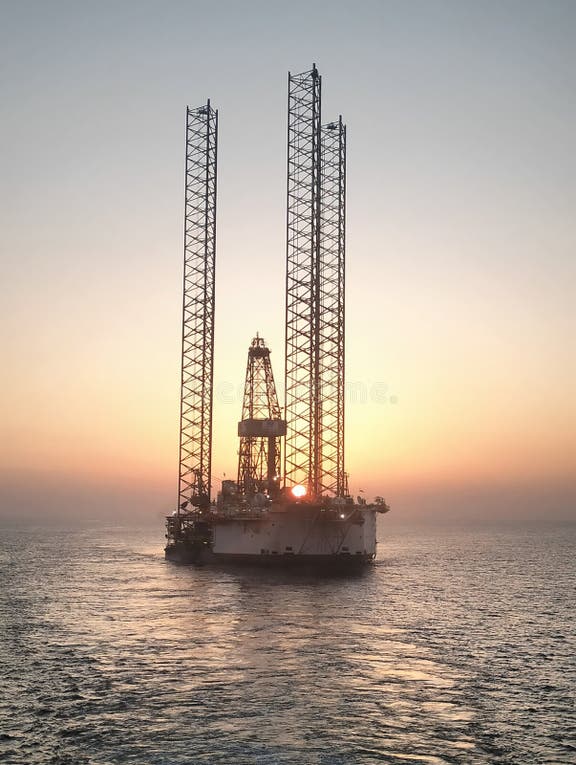 Rig Move and Sunset at Sea Offshore Stock Photo - Image of sunset, move ...
