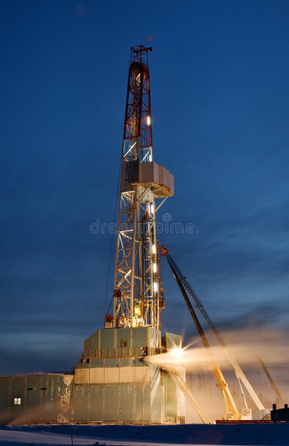 Oil Derrick at Night stock image. Image of drilling, night - 5365743