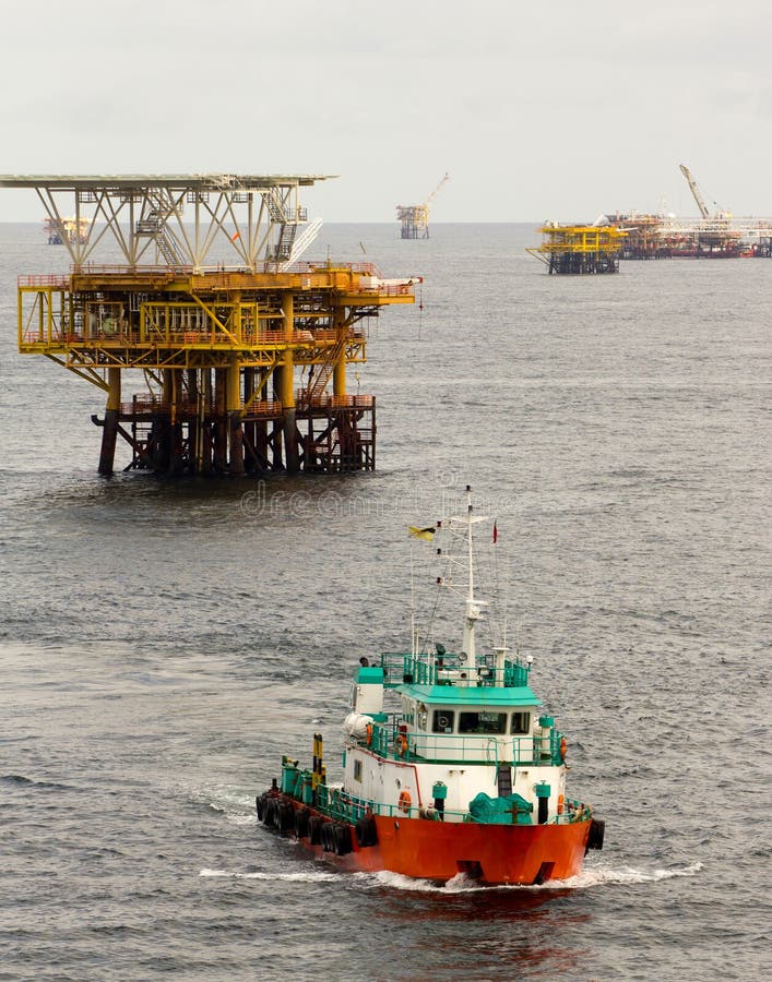 Rig workers stock image. Image of industrial, helmet - 66291649