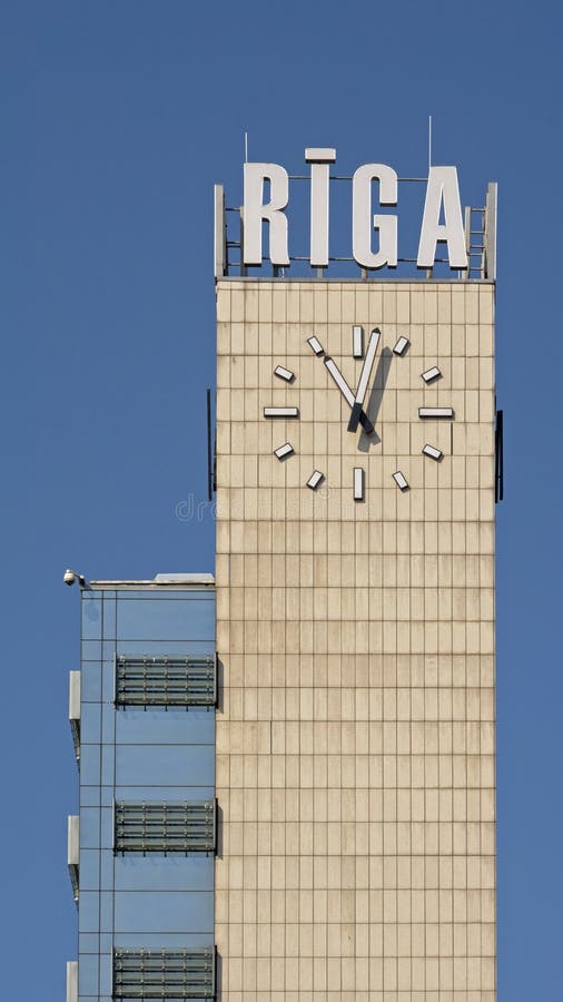 Riga clock tower, Latvia editorial photography. Image of railstation ...