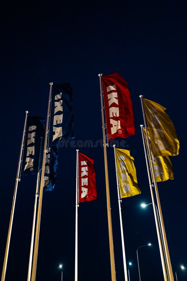 RIGA, LATVIA - APRIL 3, 2019: IKEA Flags during Dark Evening and Wind ... RIGA, LATVIA - APRIL 3, 2019: IKEA Flags during Dark Evening and Wind ...