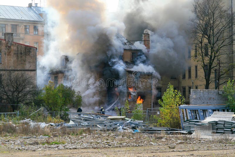 Riga, October, 2007, an Old Timber Building on Fire Editorial ...