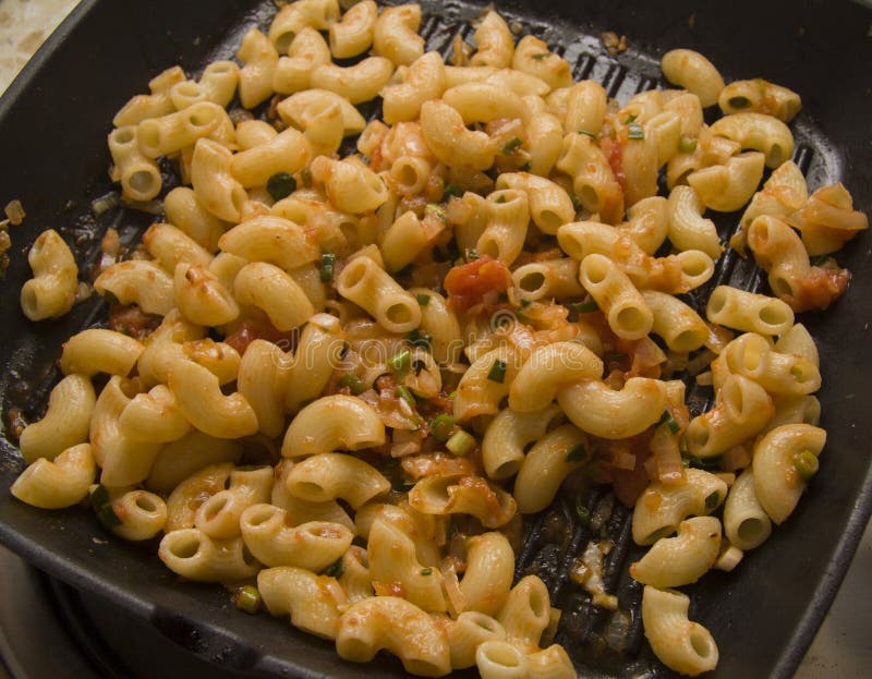 Rigati on pan stock image. Image of mediterranean, basil - 60876155