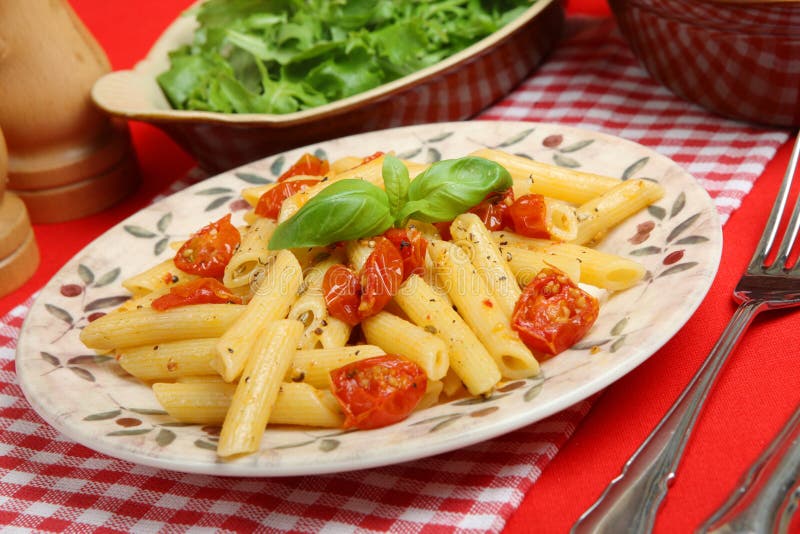 Rigatoni Pasta with Roast Cherry Tomatoes Stock Image - Image of flutes ...