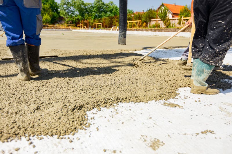 Riggers, Workers Use Rake and Handmade Wooden Tool To Level Fresh ...
