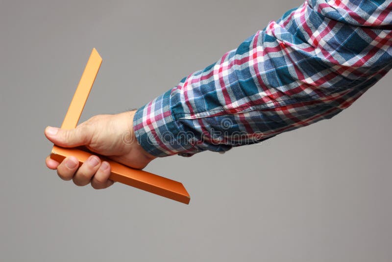 Right Angle in the Hand of an Adult Stock Image - Image of ...