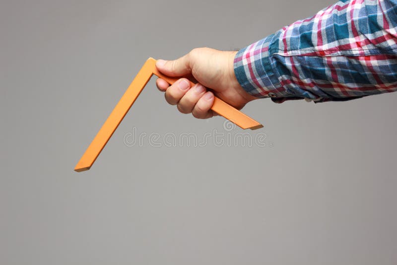 Right Angle in the Hand of an Adult Stock Image - Image of engineers ...