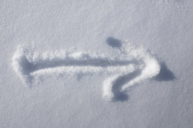 Right Arrow Drawn in Snow stock photo. Image of arrow - 86572842