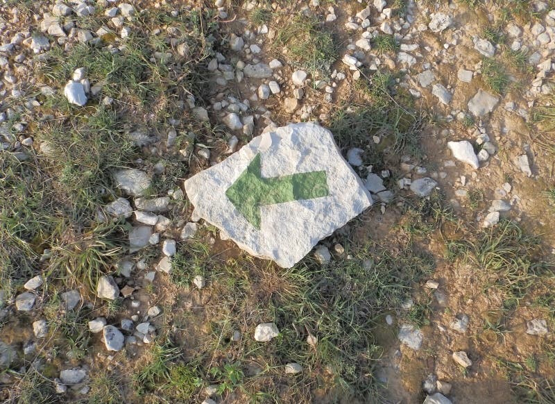 Right Direction - Green Left Arrow on the Ground Stock Photo - Image of ...