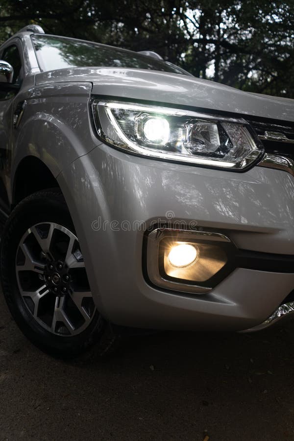 Right Front Bottom View of a Car with the Lights on, Original Alloy ...