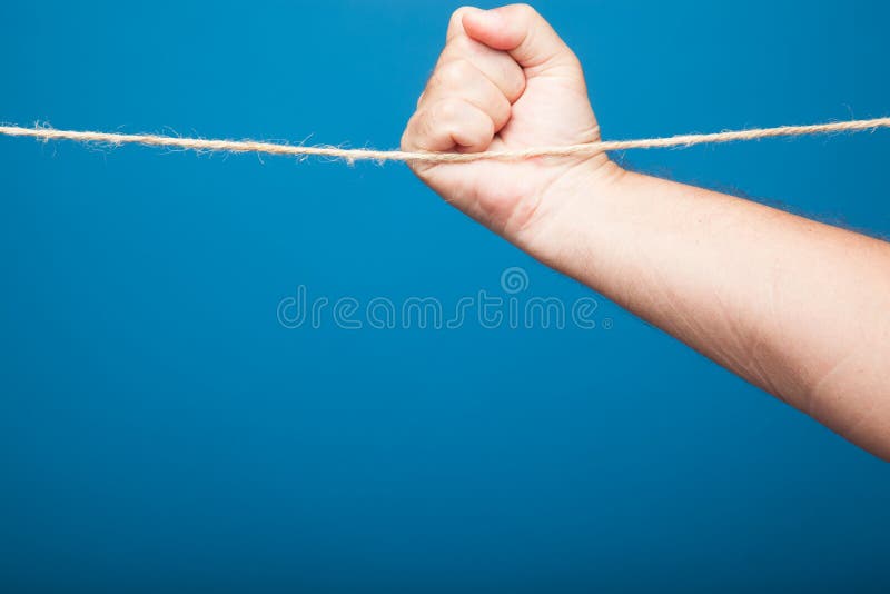 Fist of the Right Hand with Rope Stock Photo - Image of hand, closed ...
