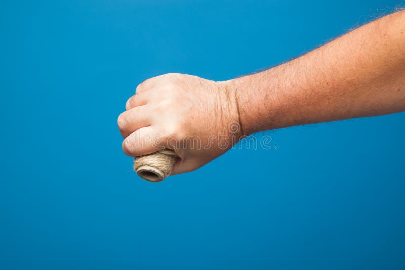 Fist of the Right Hand with Rope Stock Image - Image of rope, roll ...