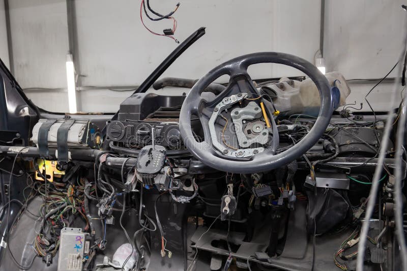 Right-hand Drive Car Interior in the Back of a Van with a Disassembled ...