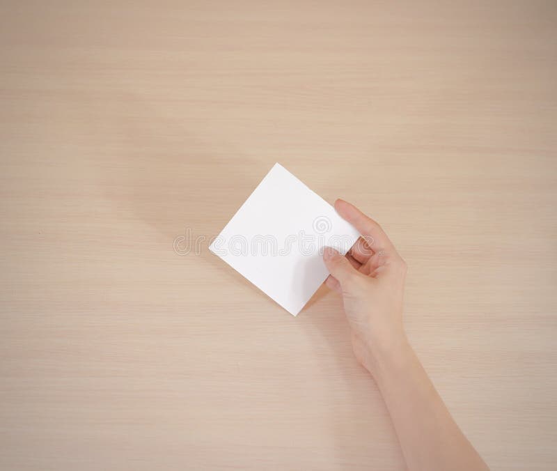 Right Hand Holding Square White Paper in the Right Hand. Leaflet Stock ...