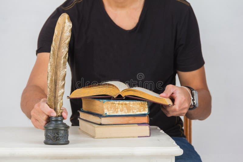 Right Hand of Man Hold Feather Pen and Left Hand Open Book Stock Image ...