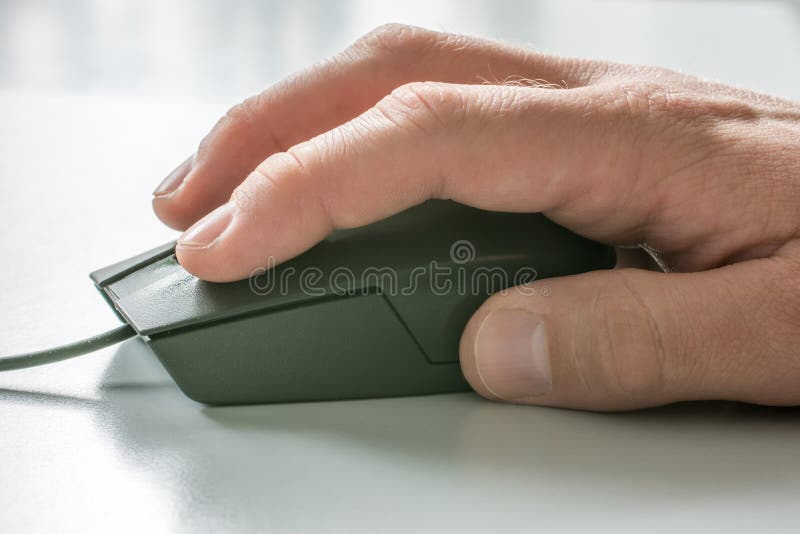 Men Hand on Computer Mouse with White Desk in the Background Stock ...