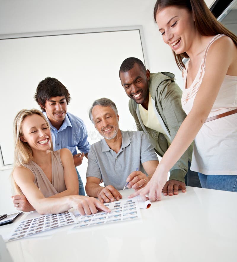 The Right People for the Job. a Group of Excited Colleagues Working on ...