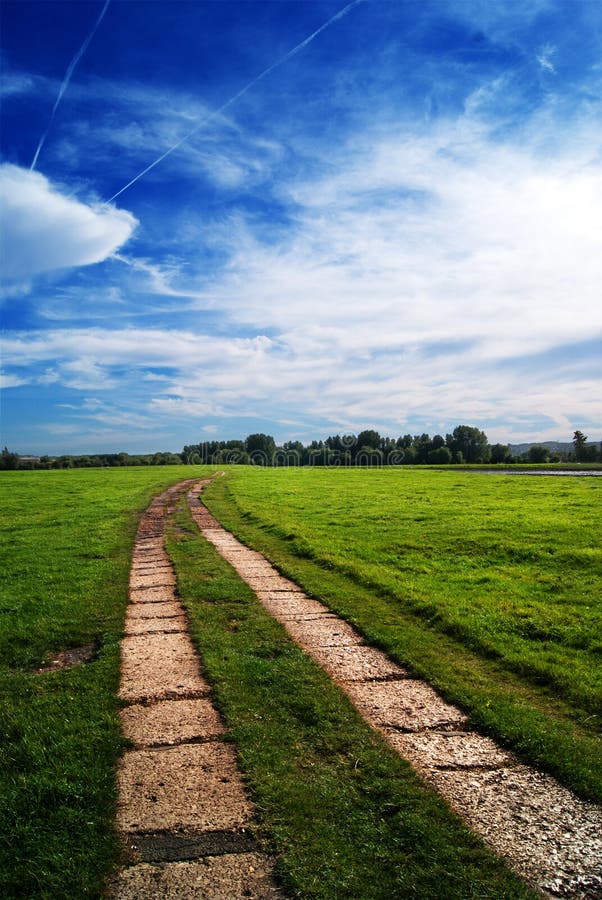 Right turn path stock photo. Image of green, blue, cloud - 27699132
