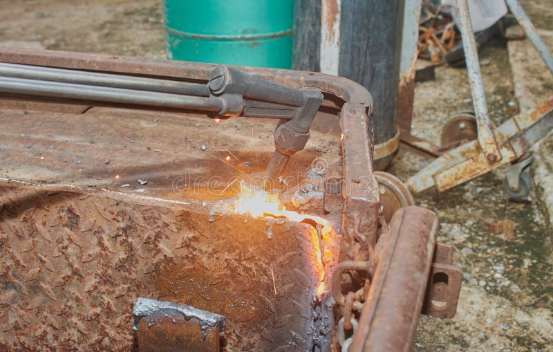 Right View of Car Body Part Removal by Oxygen Acetylene Cutting Torch ...