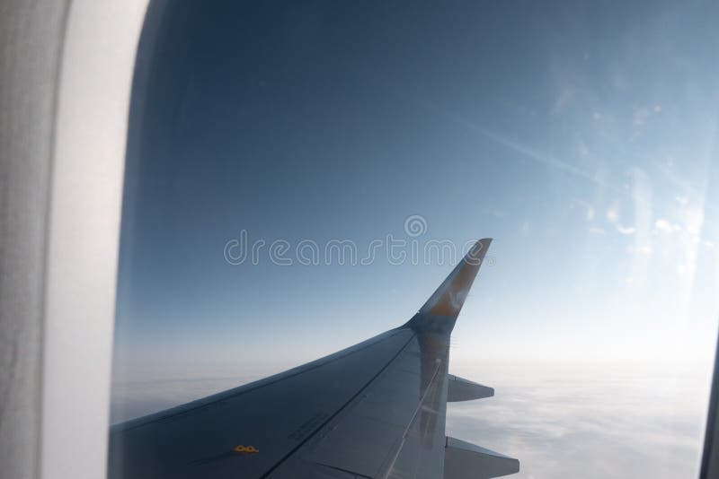 Right Wing of the Plane Rises into the Blue Sky Stock Image - Image of ...