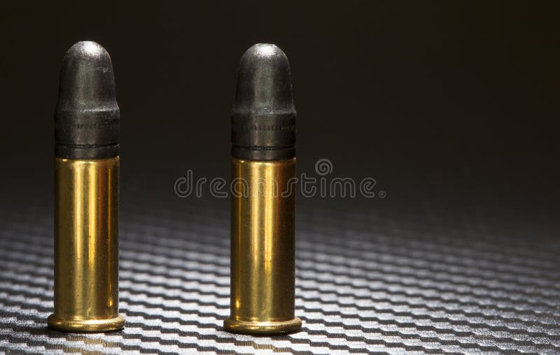 Rim fire ammo stock image. Image of bronze, ammunition - 64413187