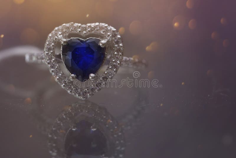 Ring blue gemstone heart stock image. Image of platinum - 125139727