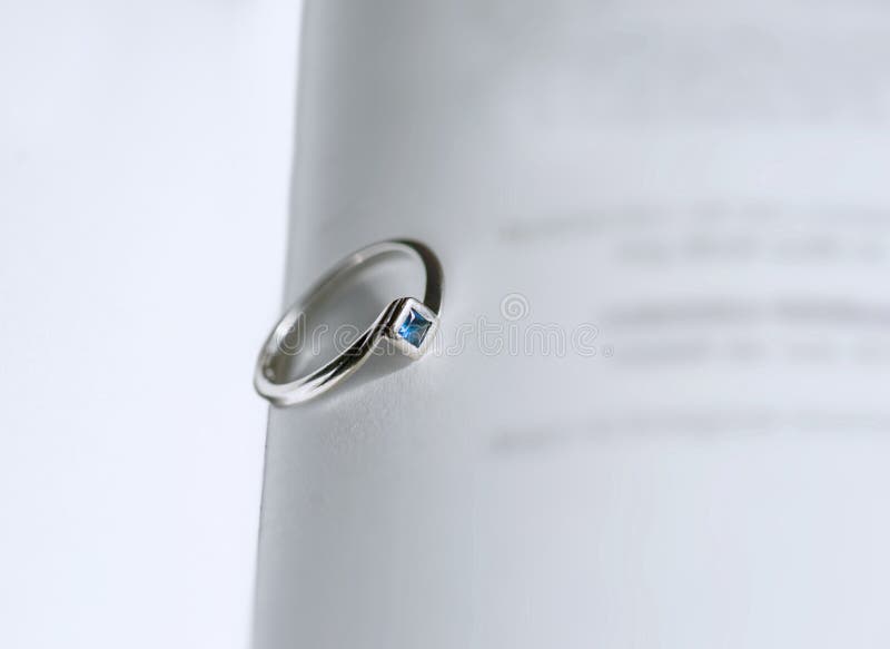 Ring in book stock image. Image of blue, stone, book - 19180013