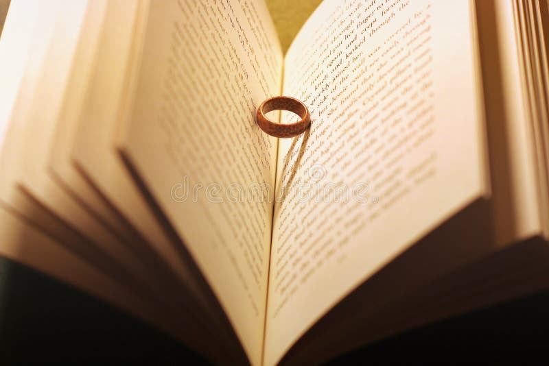 The Ring in the Book. Wooden Ring Stock Photo - Image of card, abstract ...