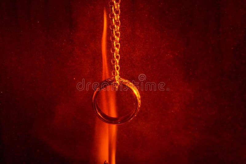 Ring on a Chain on the Flame Background Stock Image - Image of fire ...